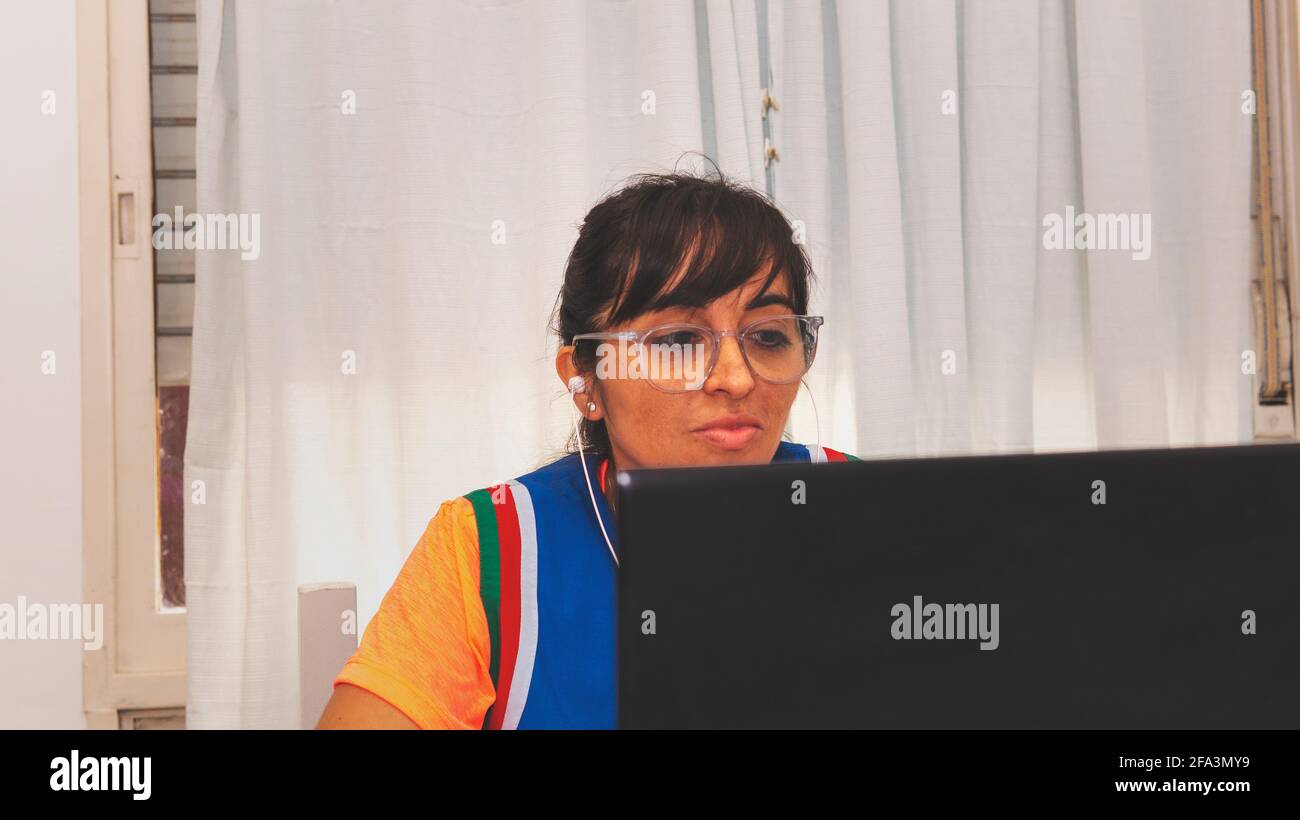 Young teacher in a remote class Stock Photo - Alamy