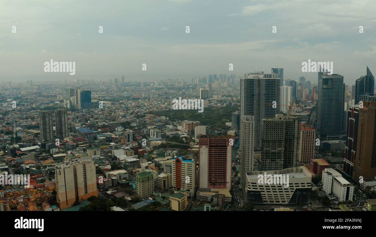 Aerial view of Panorama of Manila with skyscrapers and business centers ...
