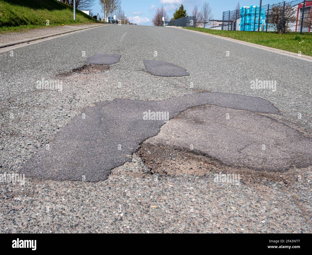 Broken road with cracks in the road surface hi-res stock photography ...