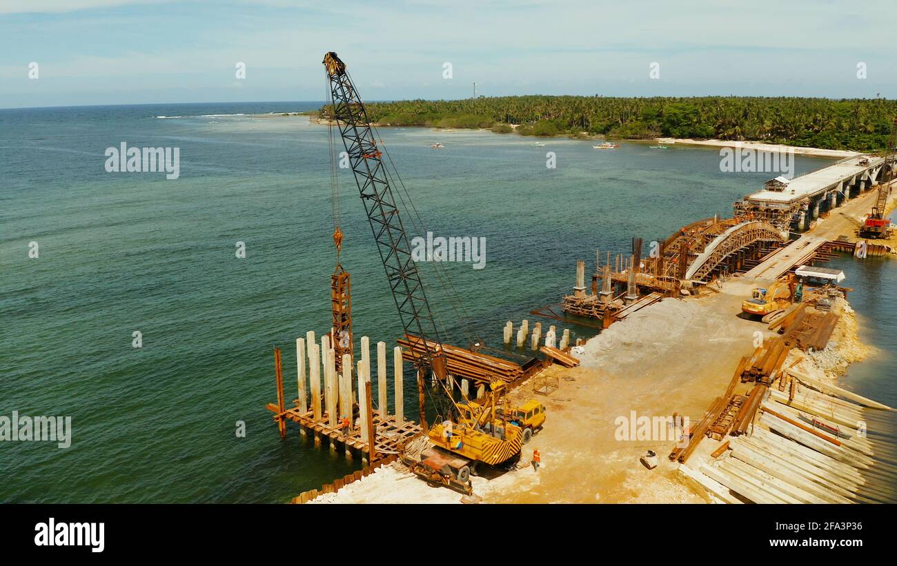 Pile driving machine in construction site.The bridge under construction ...