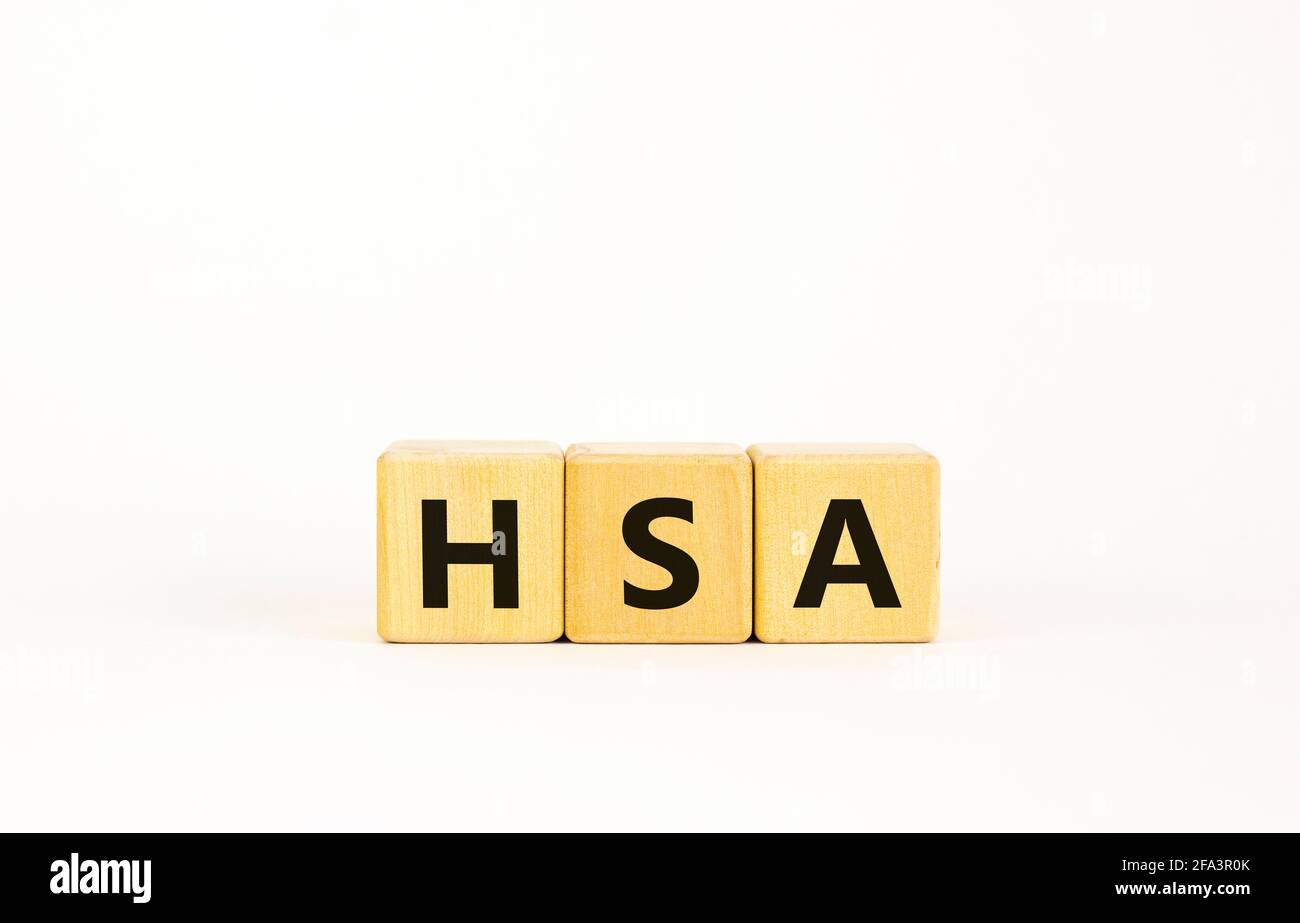 HSA, health savings account symbol. Wooden cubes with words 'HSA ...