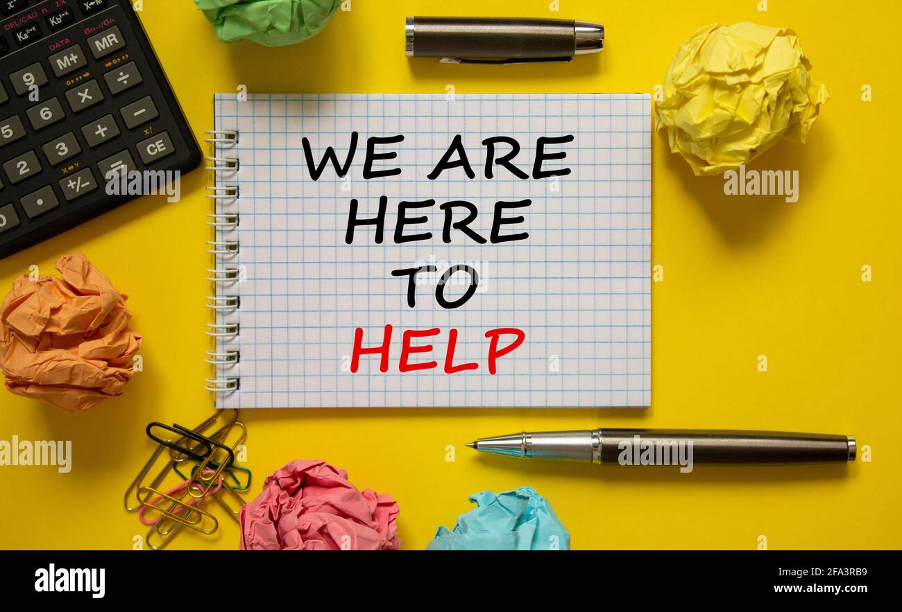 Help and support symbol. White note with words 'we are here to help' on ...