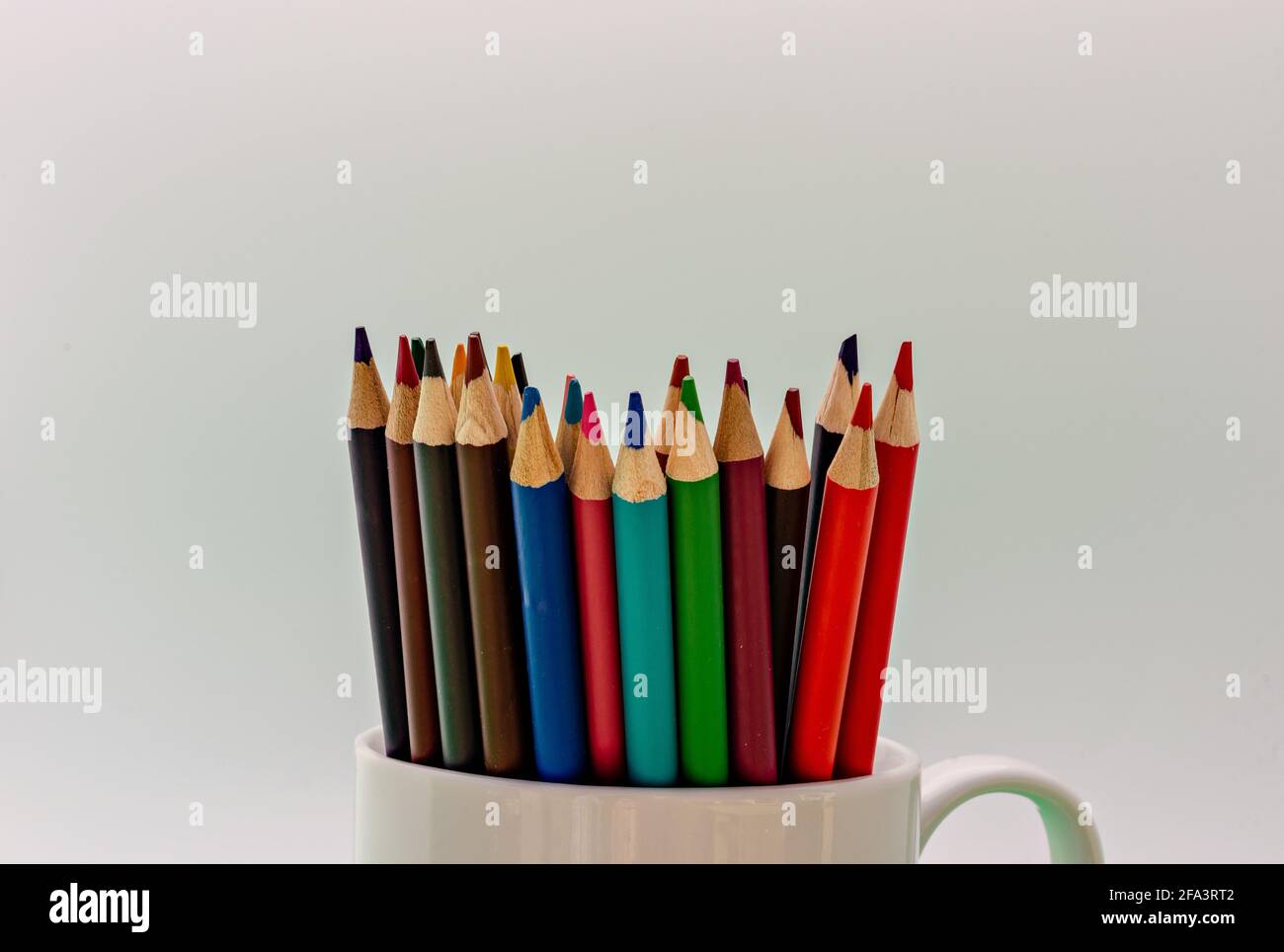 Colorful pencils in a cup Stock Photo - Alamy