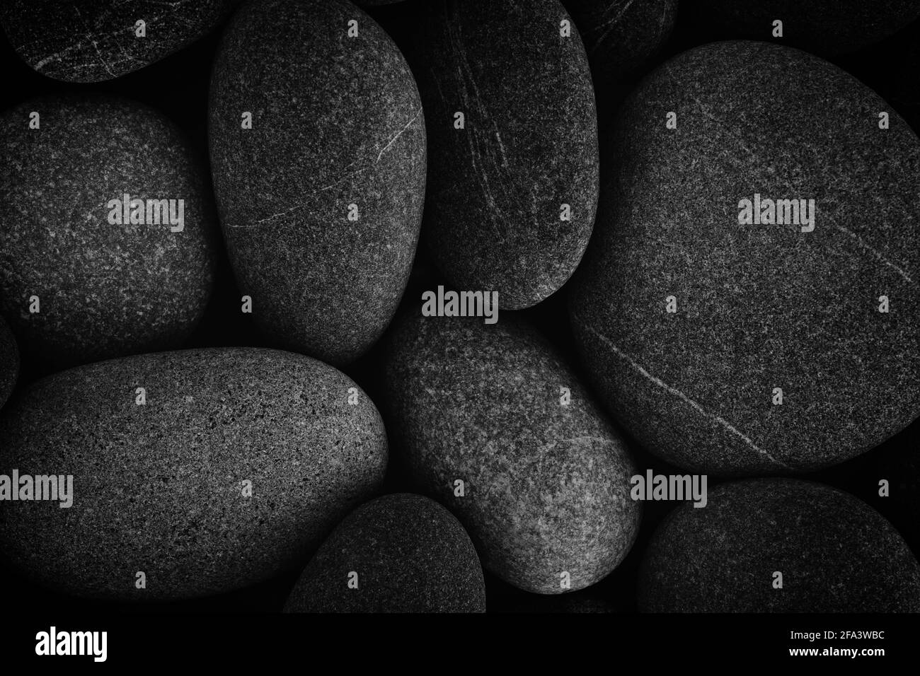 Dark black abstract smooth round pebbles sea texture background Stock ...