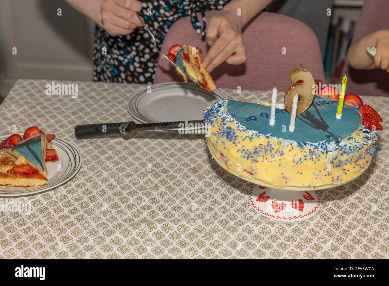 Child cutting birthday cake hi-res stock photography and images - Alamy