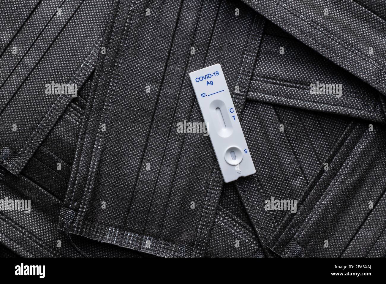 Covid-19 rapid antigen test. Rapid antibodies test kit and black ...