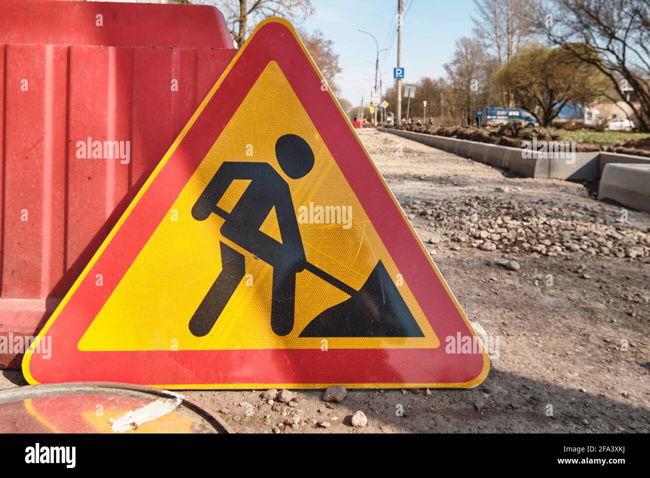 Man digging road work sign hi-res stock photography and images - Alamy