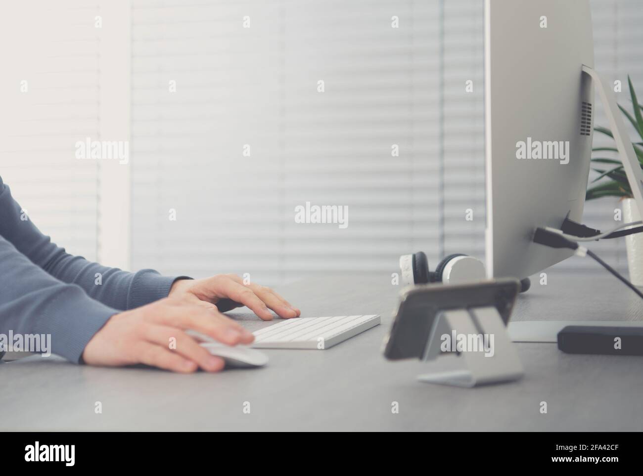 Men Behind Office Desk Working on His Desktop Computer. Left Top Copy ...