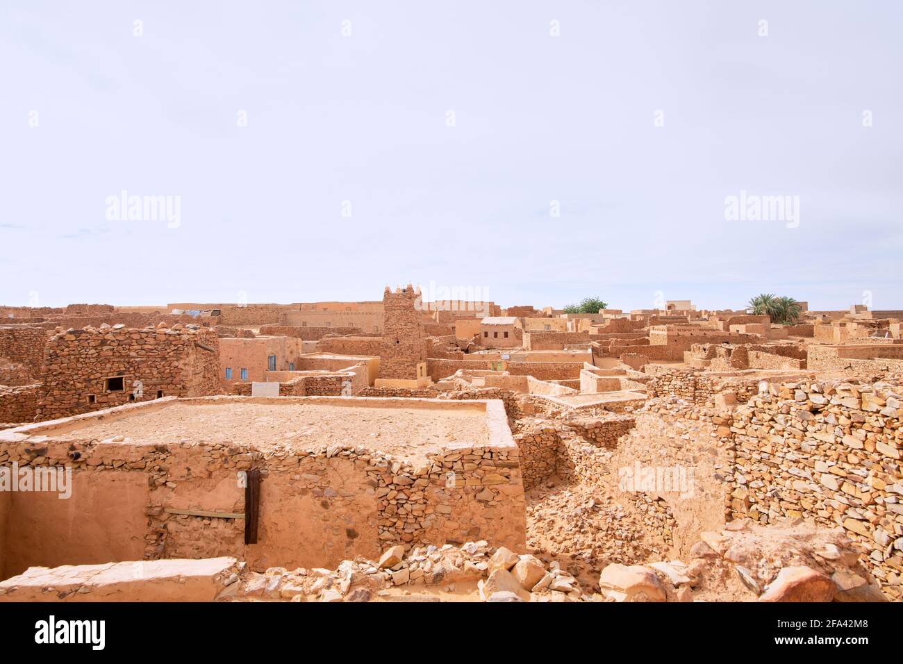 The Friday Mosque of Chinguetti, Mauritania, and surrounding buildings ...