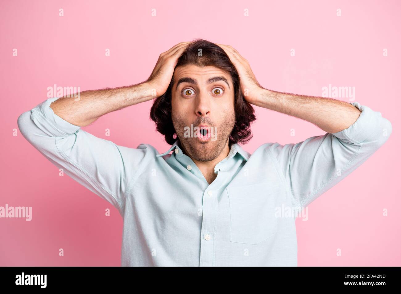 Close up portrait of confused person put arms on head open mouth fear ...