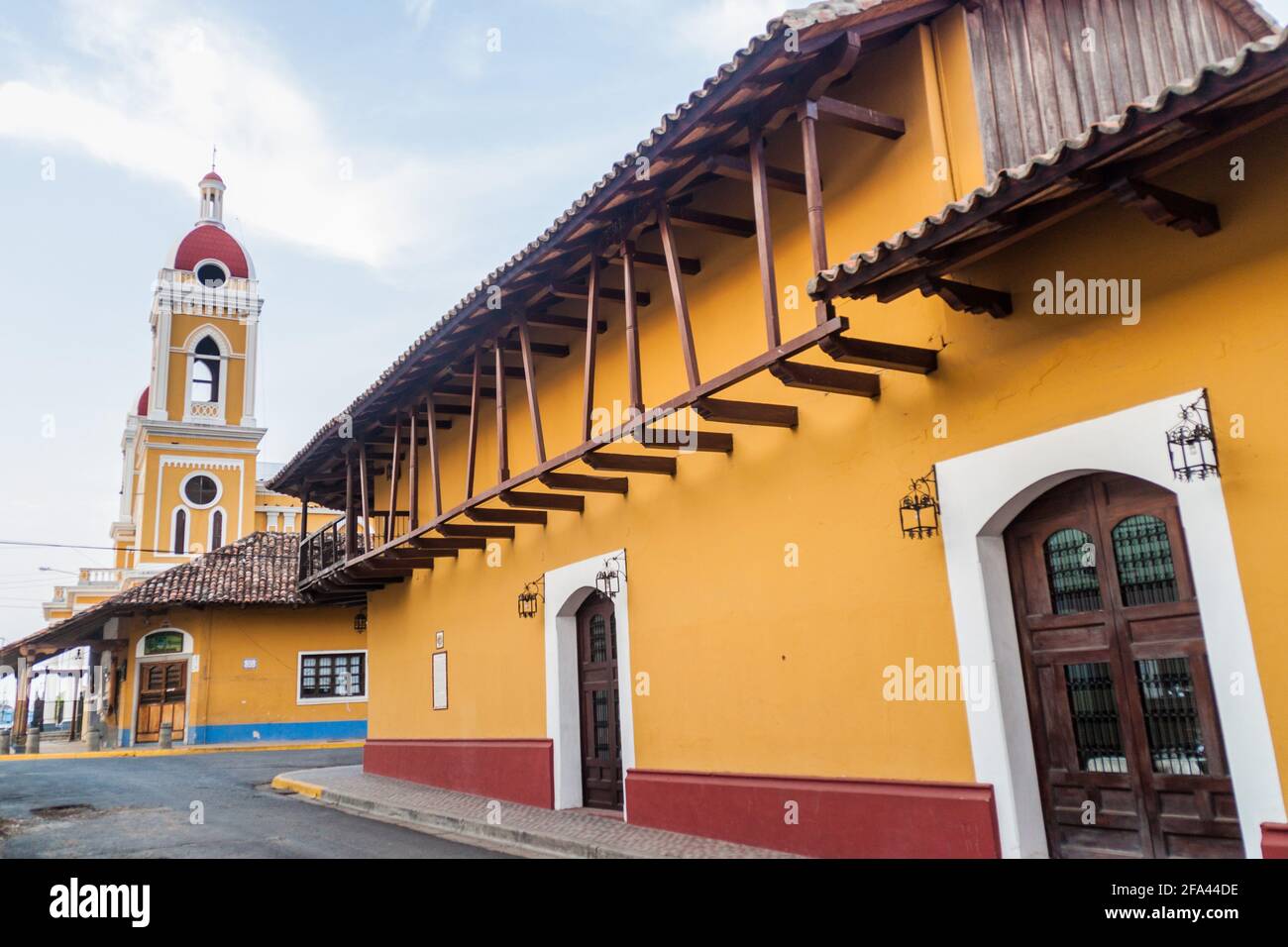 Colonial buildings and a cathedral in Granada, Nicaragua Stock Photo ...