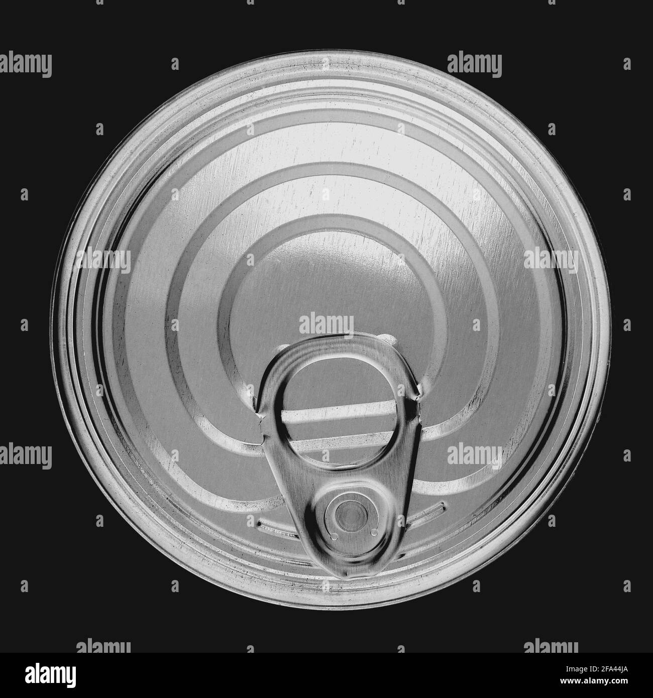 a tin can for canned food conservation isolated over black background ...