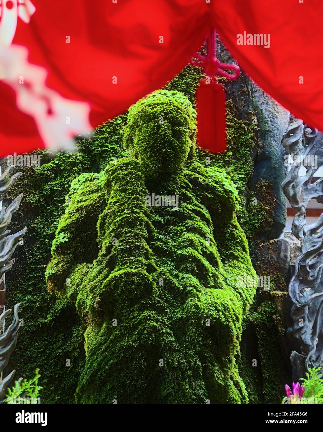 Osaka, Japan - November 5 2020: Daytime view of the moss-covered statue ...