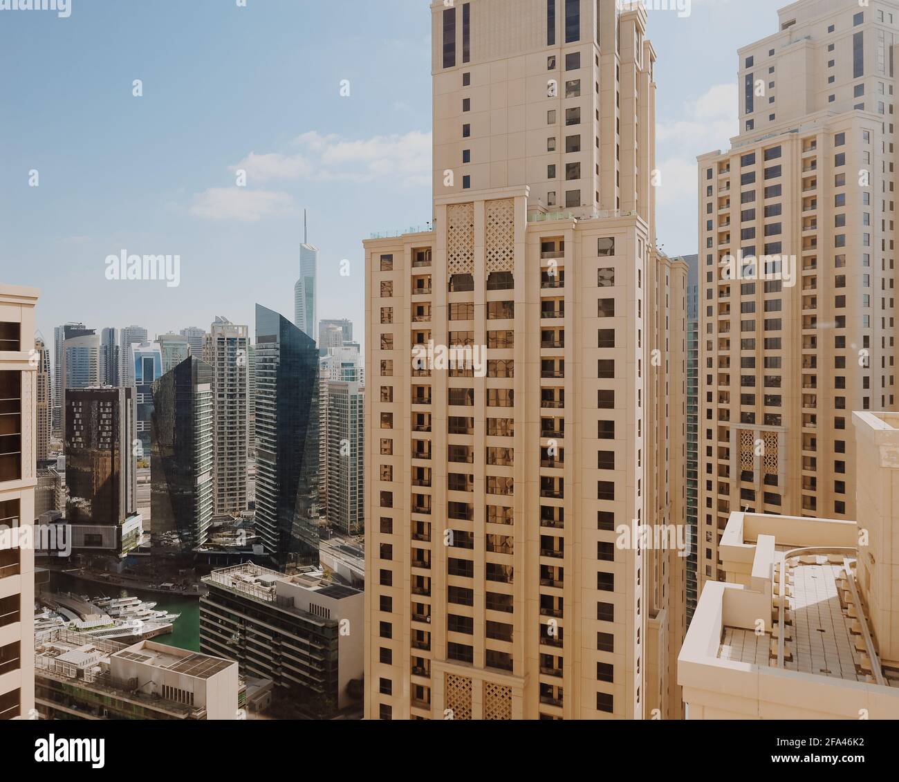 Modern urban Dubai landscape with Marina water and Jumeirah Beach ...