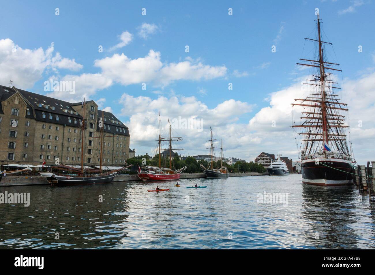 A majestic ancient sailing ship moored at the port of Copenhagen ...