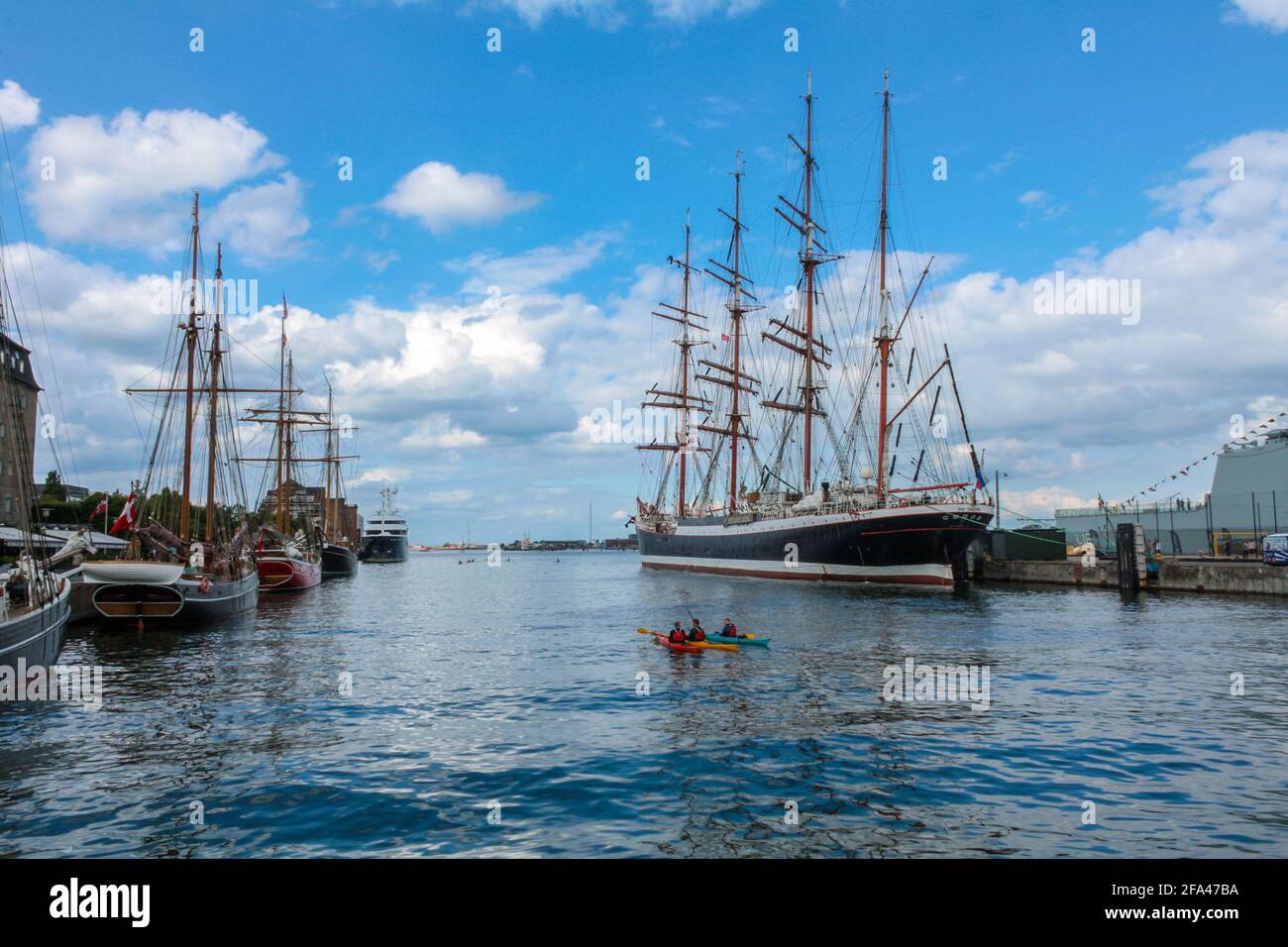 A majestic ancient sailing ship moored at the port of Copenhagen ...