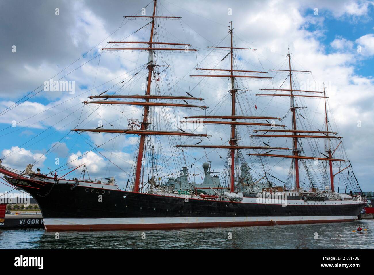 A majestic ancient sailing ship moored at the port of Copenhagen ...