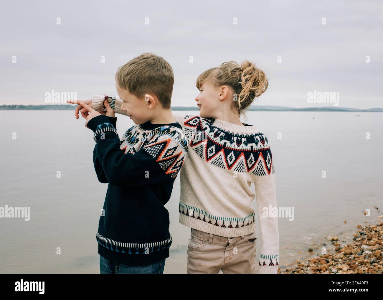 Child hugging infant siblings hi-res stock photography and images - Alamy