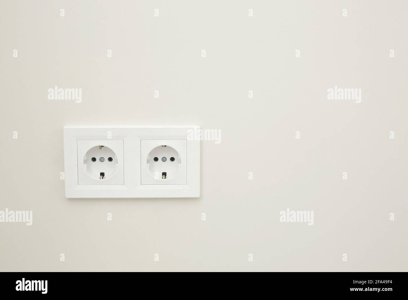 White double socket on white background.Electric plug. European high ...