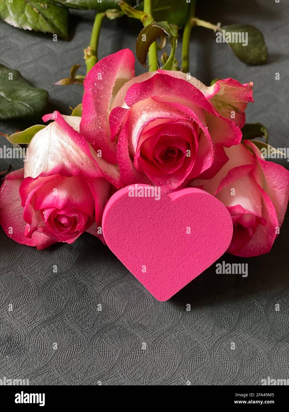Pink roses and pink heart Stock Photo - Alamy