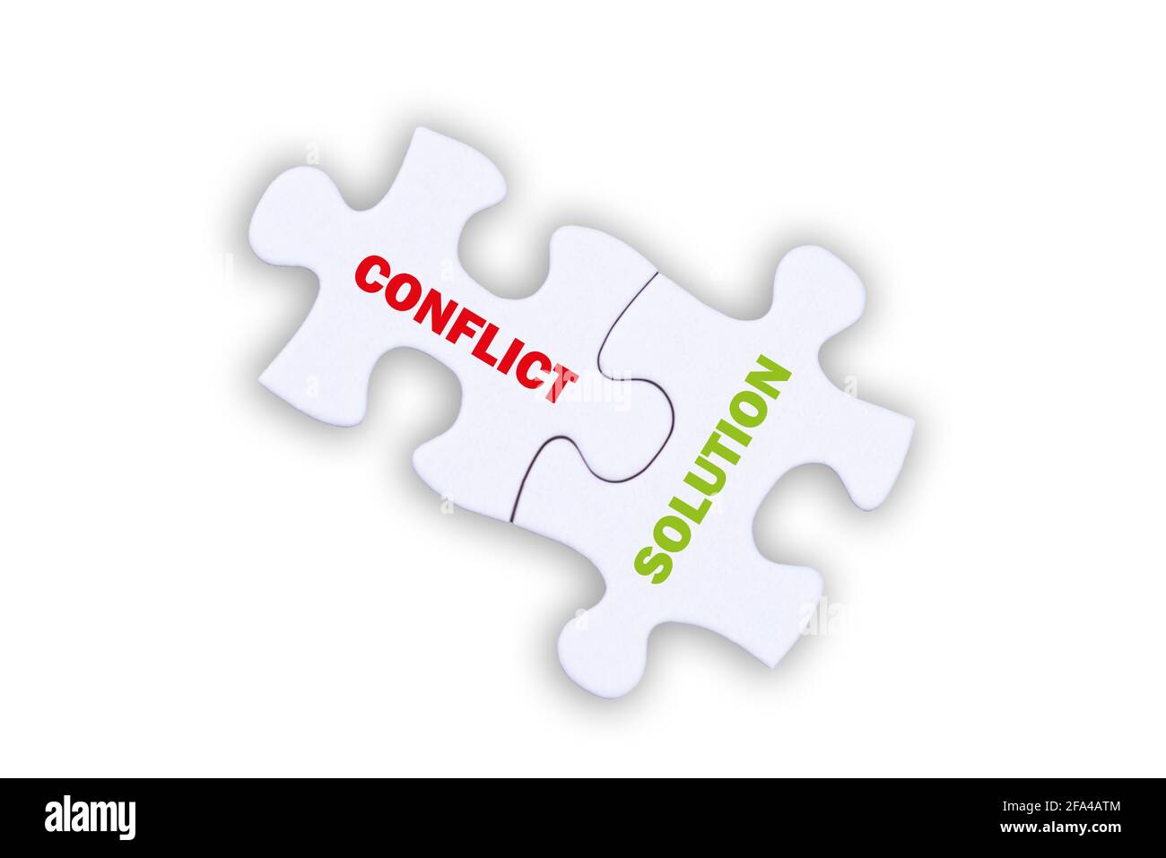 Top view of puzzle pieces with "Conflict" and "Solution" words isolated ...