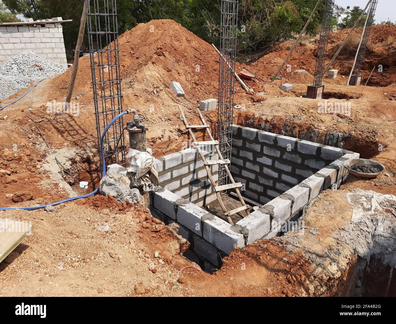 New building construction with cement block and artificial sand in a ...