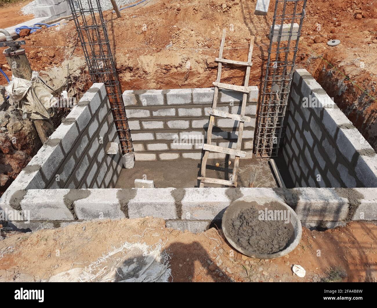 New building construction with cement block and artificial sand in a ...