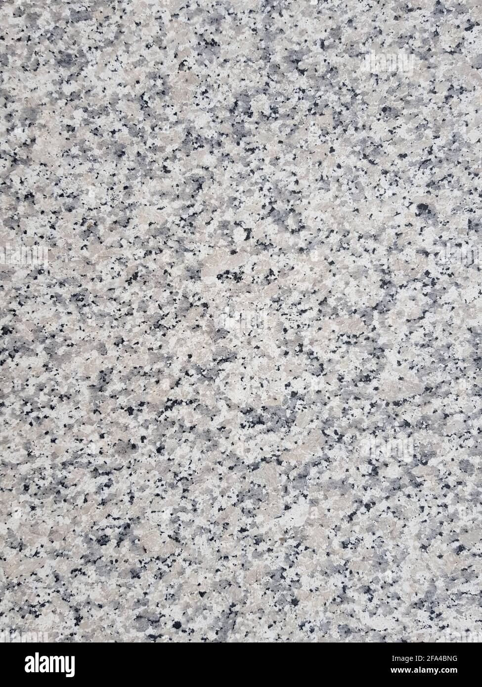 Vertical shot of a gray spotted stone texture - for background and ...
