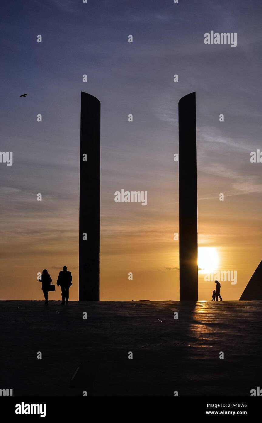 Vertical shot of people silhouette at sunset in Lisbon, Portugal Stock ...