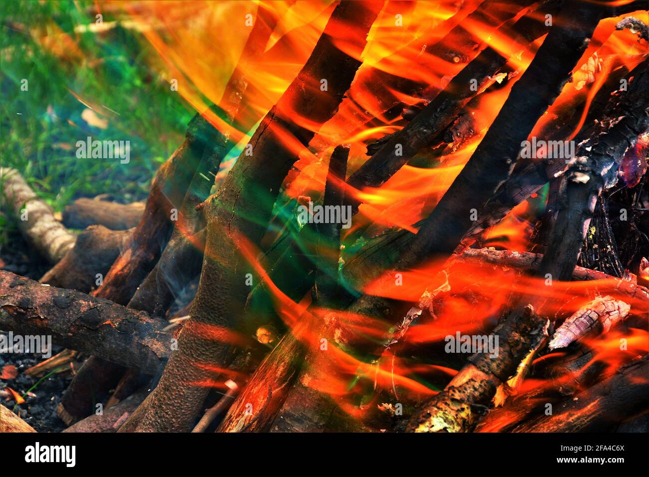 Flickering flames of fire of burning tree branches Stock Photo - Alamy
