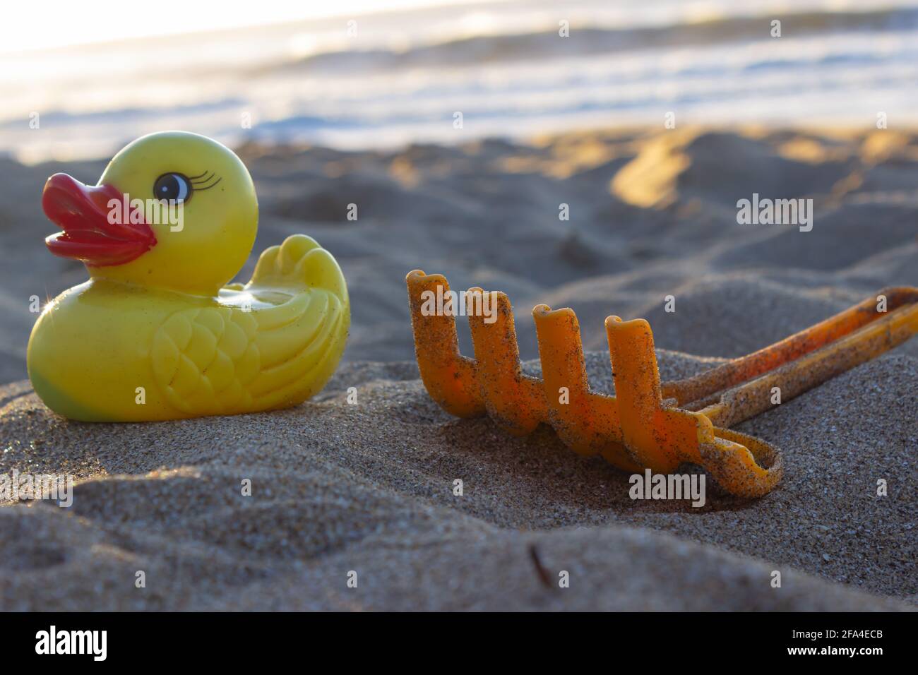 Toy sand rake hi-res stock photography and images - Alamy