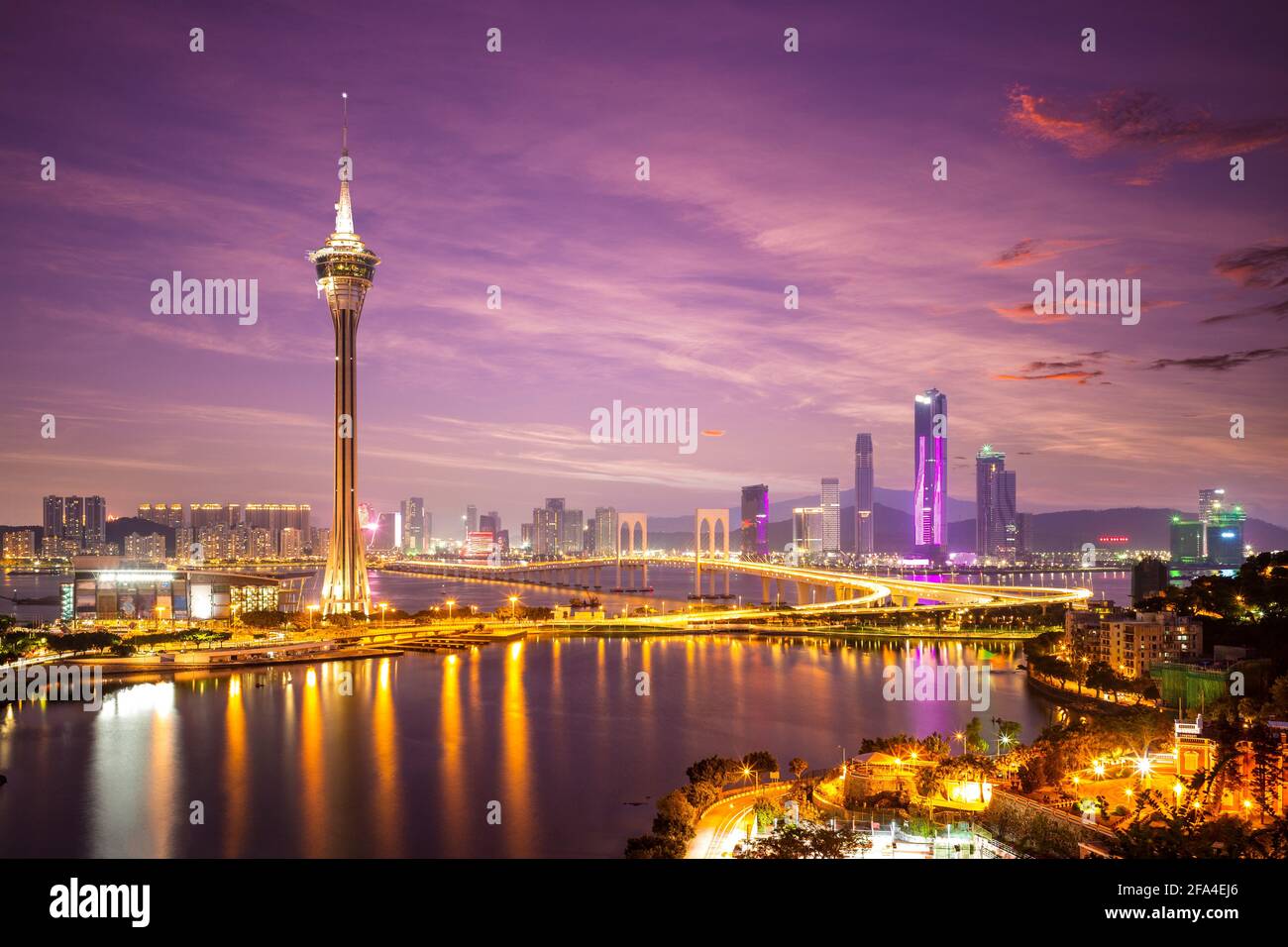 Modern downtown in Macau at night Stock Photo - Alamy