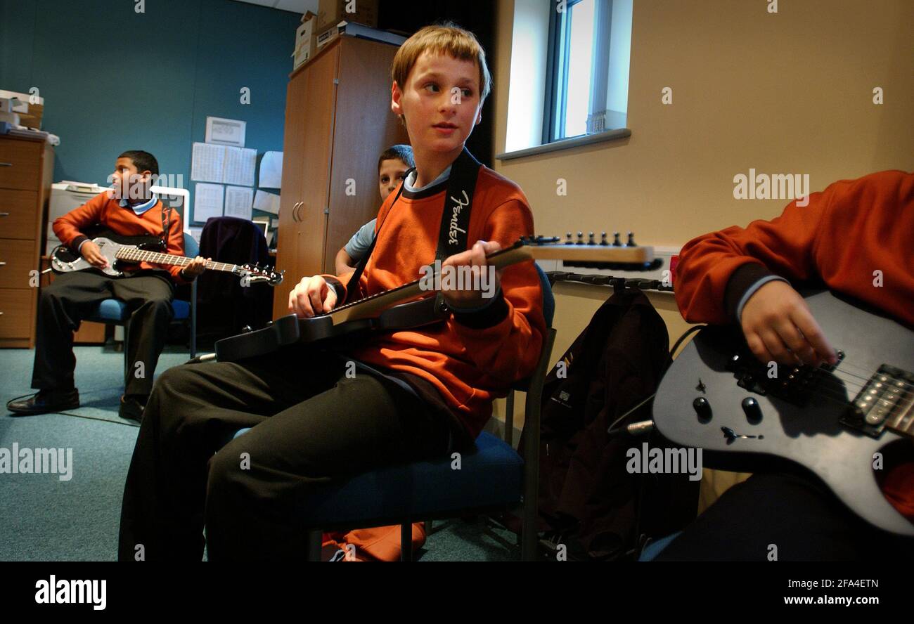 A MUSIC LESSON AT THE THE NEW LAMBETH ACADEMY.15/11/04 PILSTON Stock ...