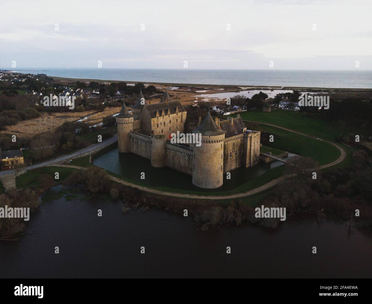 Aerial panorama view of medieval middle ages water castle Chateau de ...