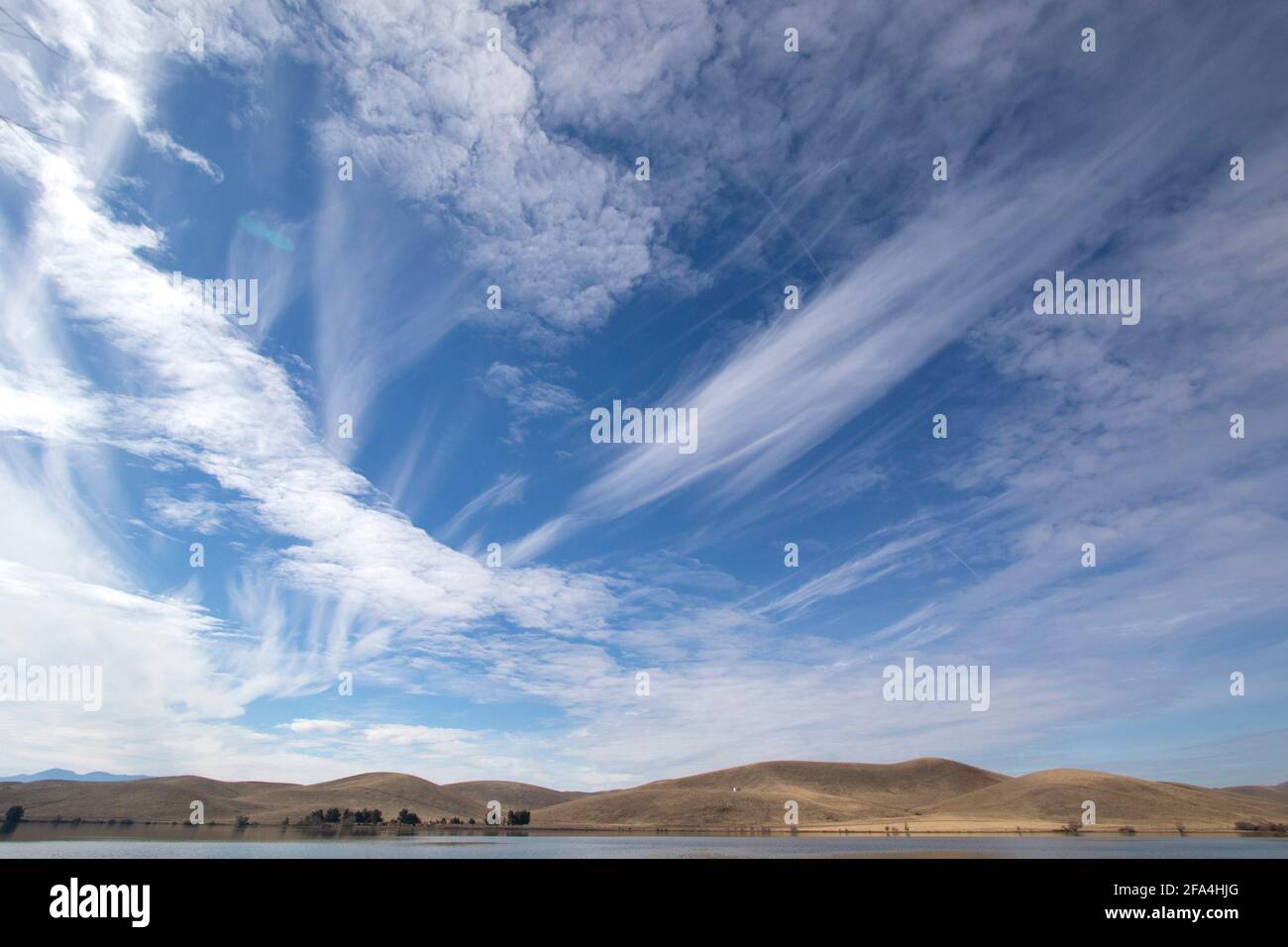 Unique cloud patterns associated with a pending winter storm form above ...