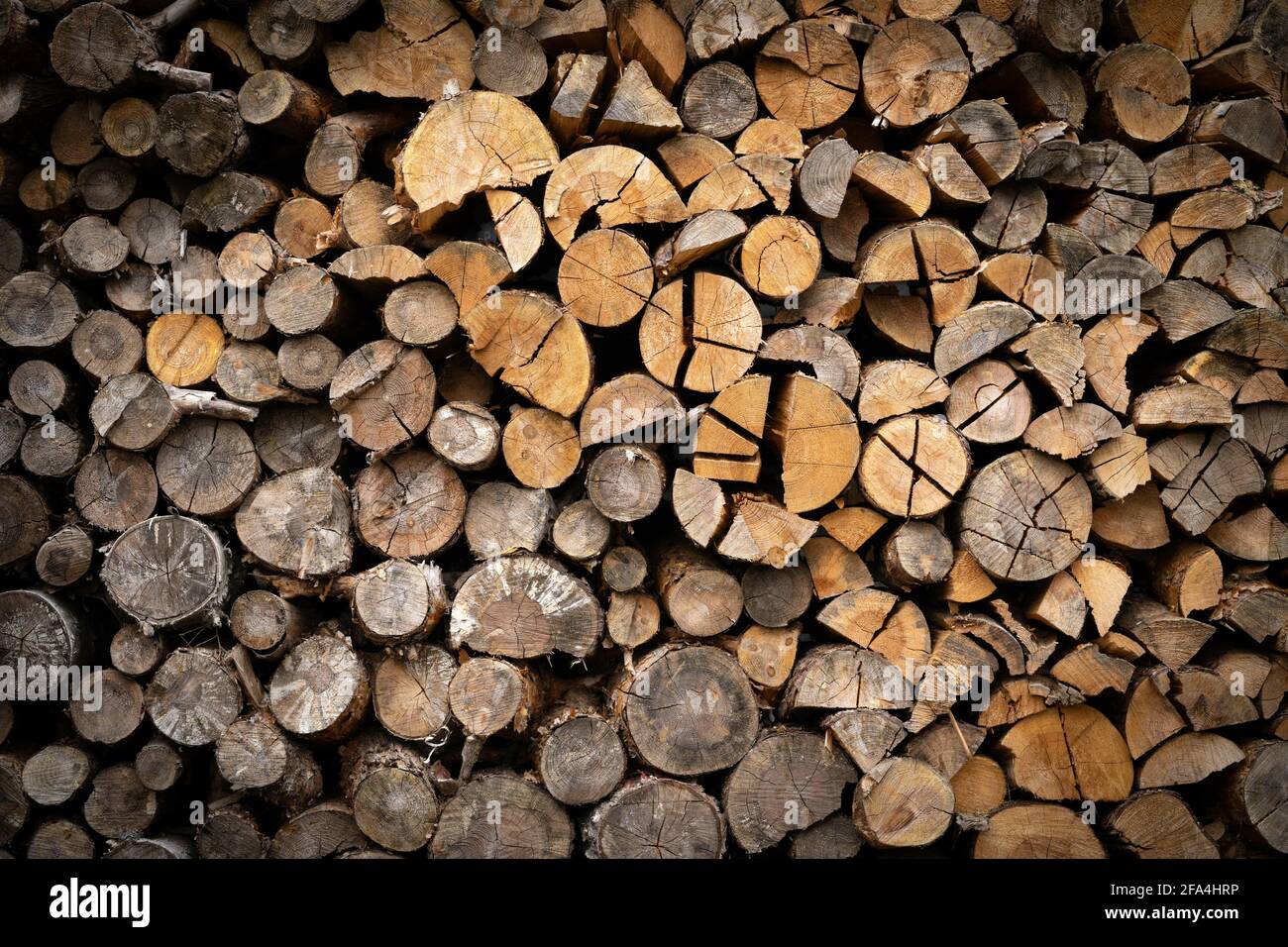 Pile of cut wood stacked together as timber Stock Photo - Alamy