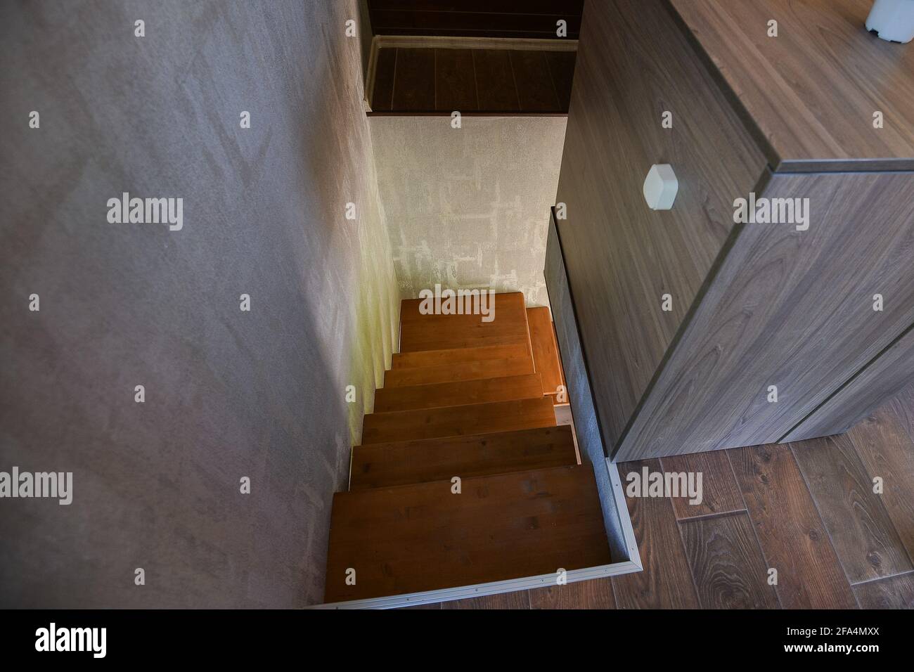 Bottom of stairs home hi-res stock photography and images - Alamy