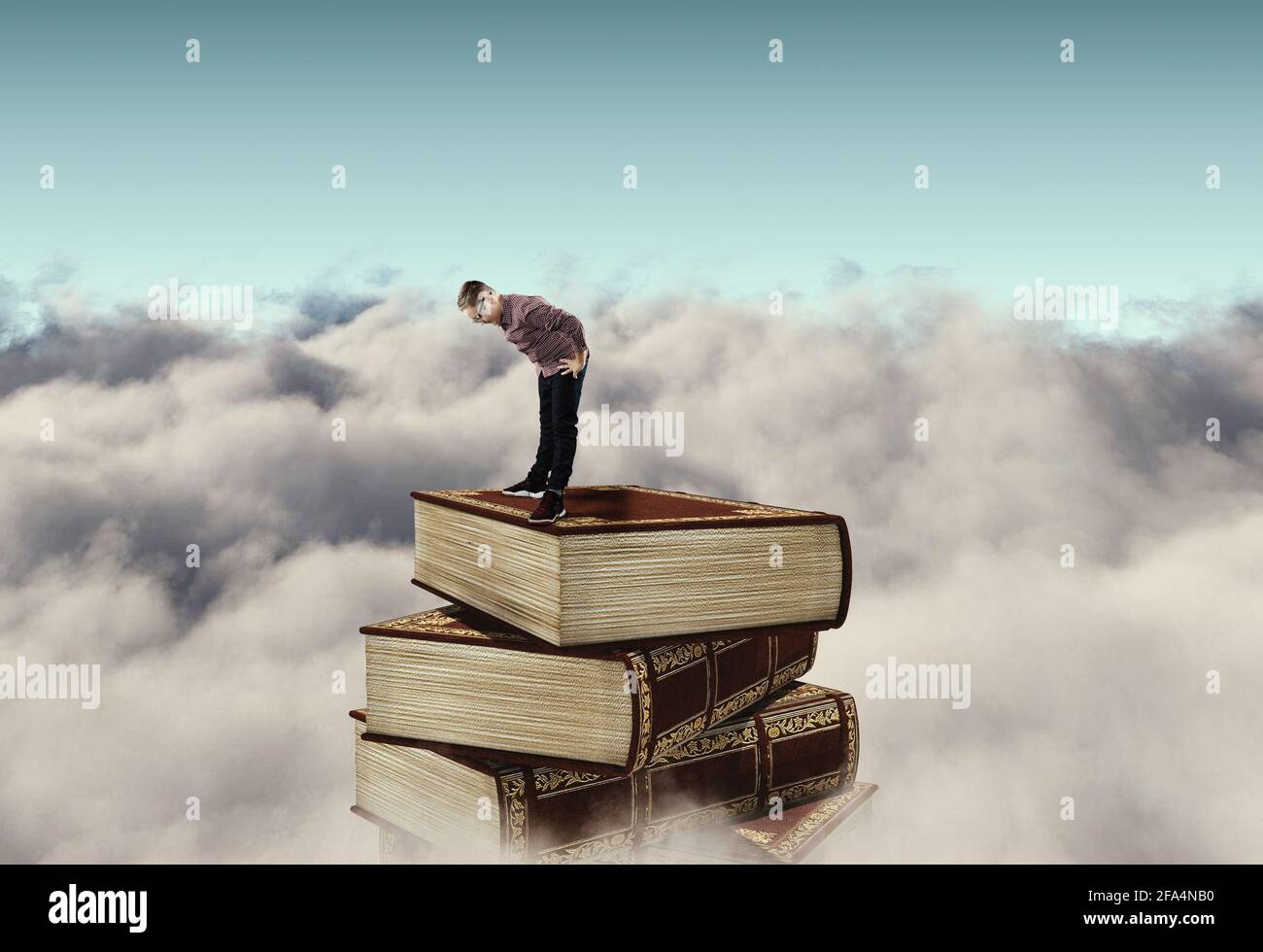 Man standing top on pile books hi-res stock photography and images - Alamy