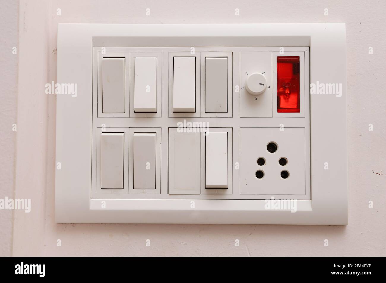 Seven switch board used mainly in drawing room Stock Photo - Alamy