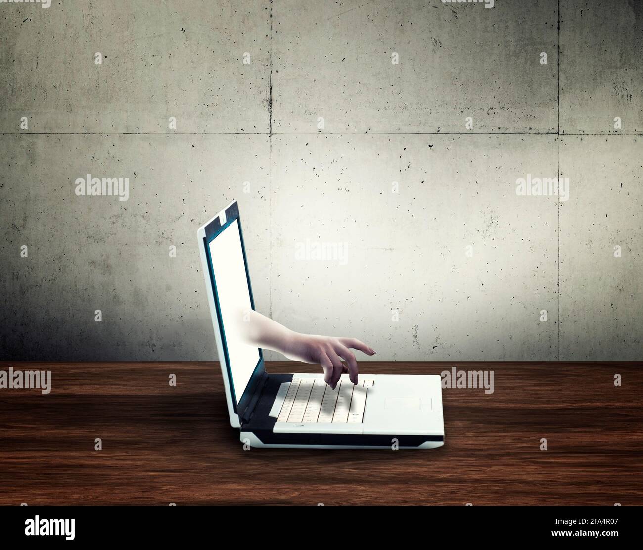 Hand reaching out of computer hi-res stock photography and images - Alamy