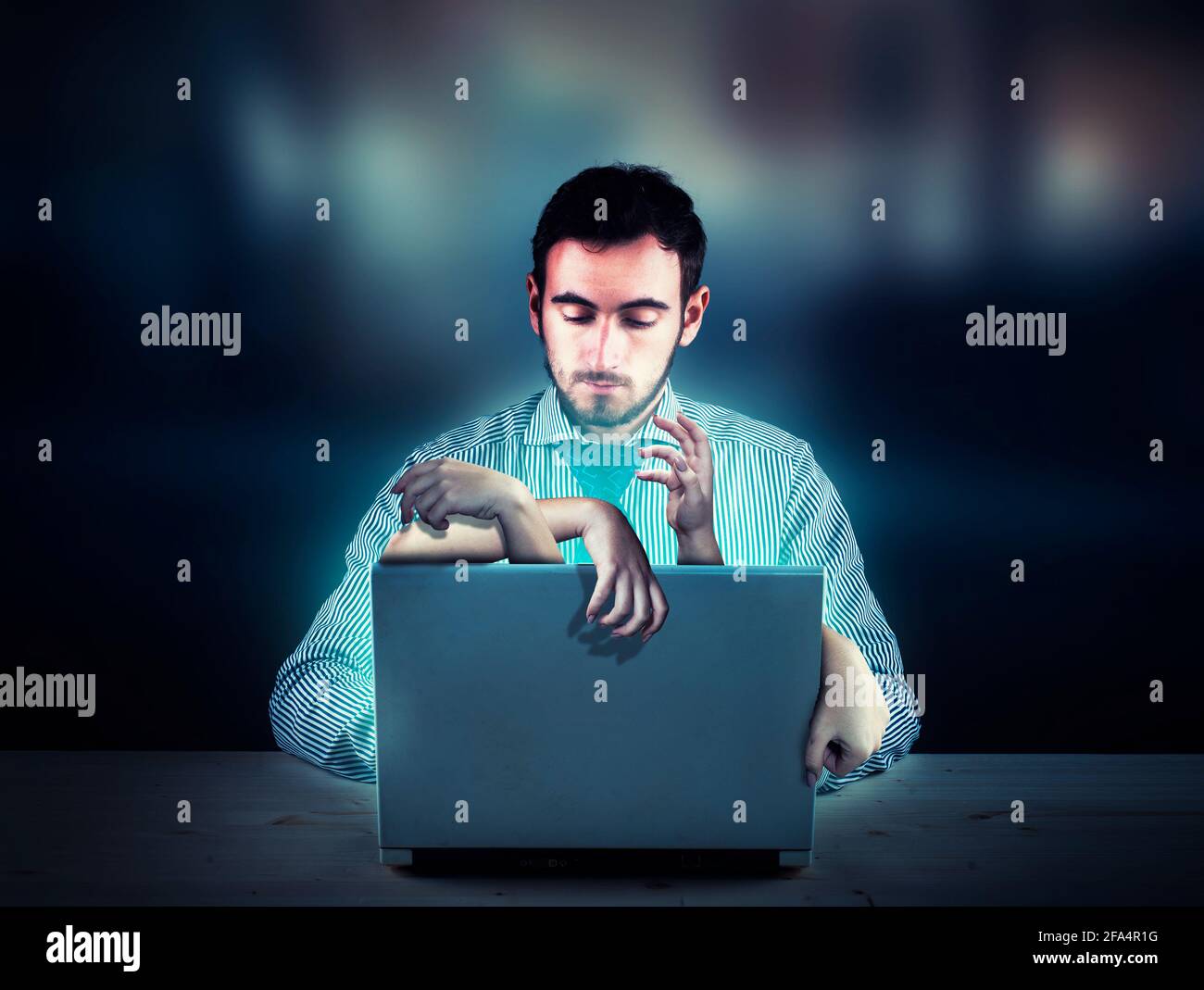 Hand reaching out of computer hi-res stock photography and images - Alamy