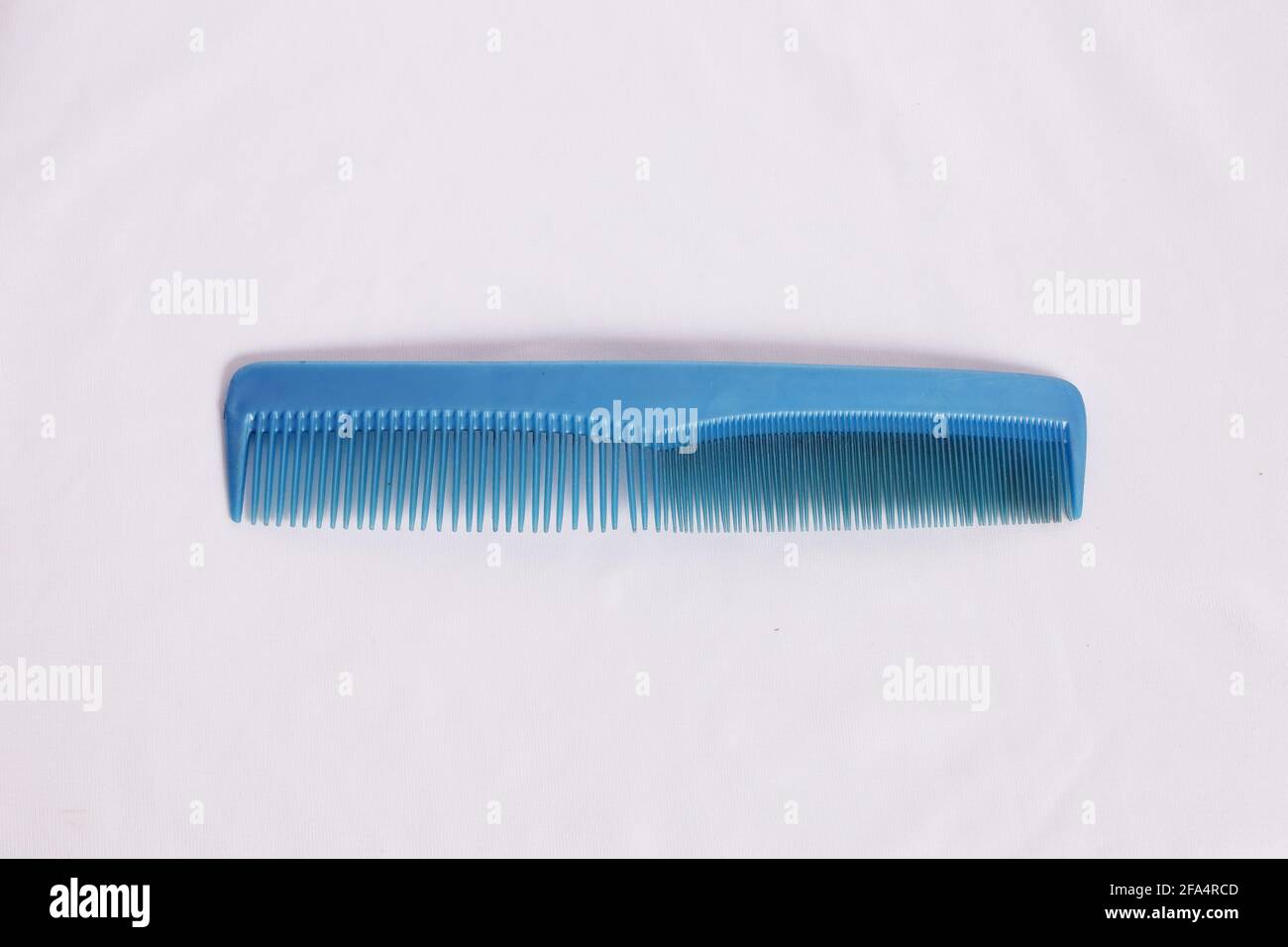 A comb made of virgin plastic Stock Photo - Alamy
