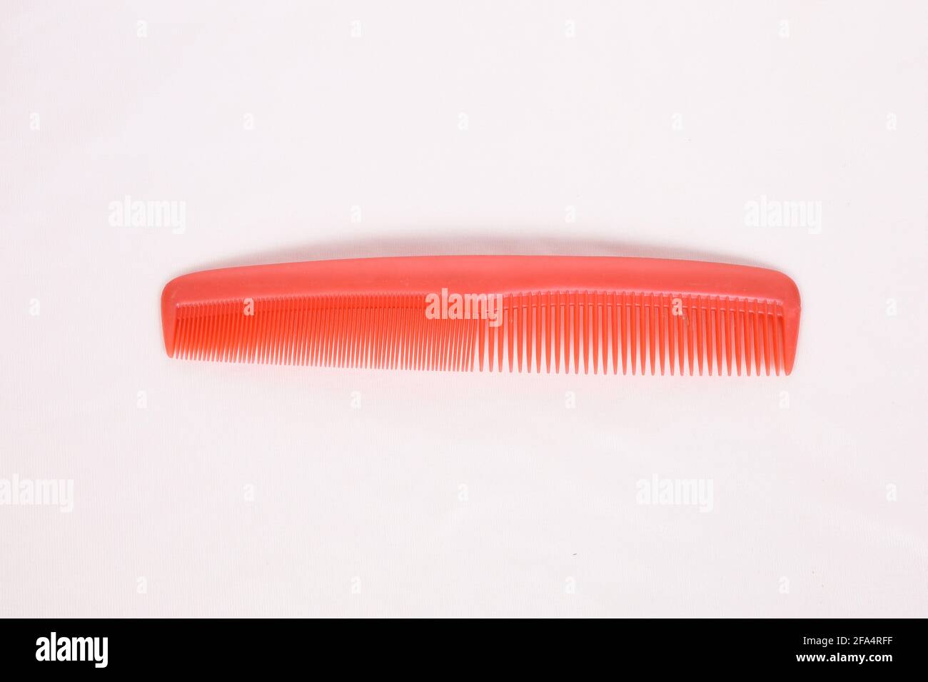 A comb made of virgin plastic Stock Photo - Alamy