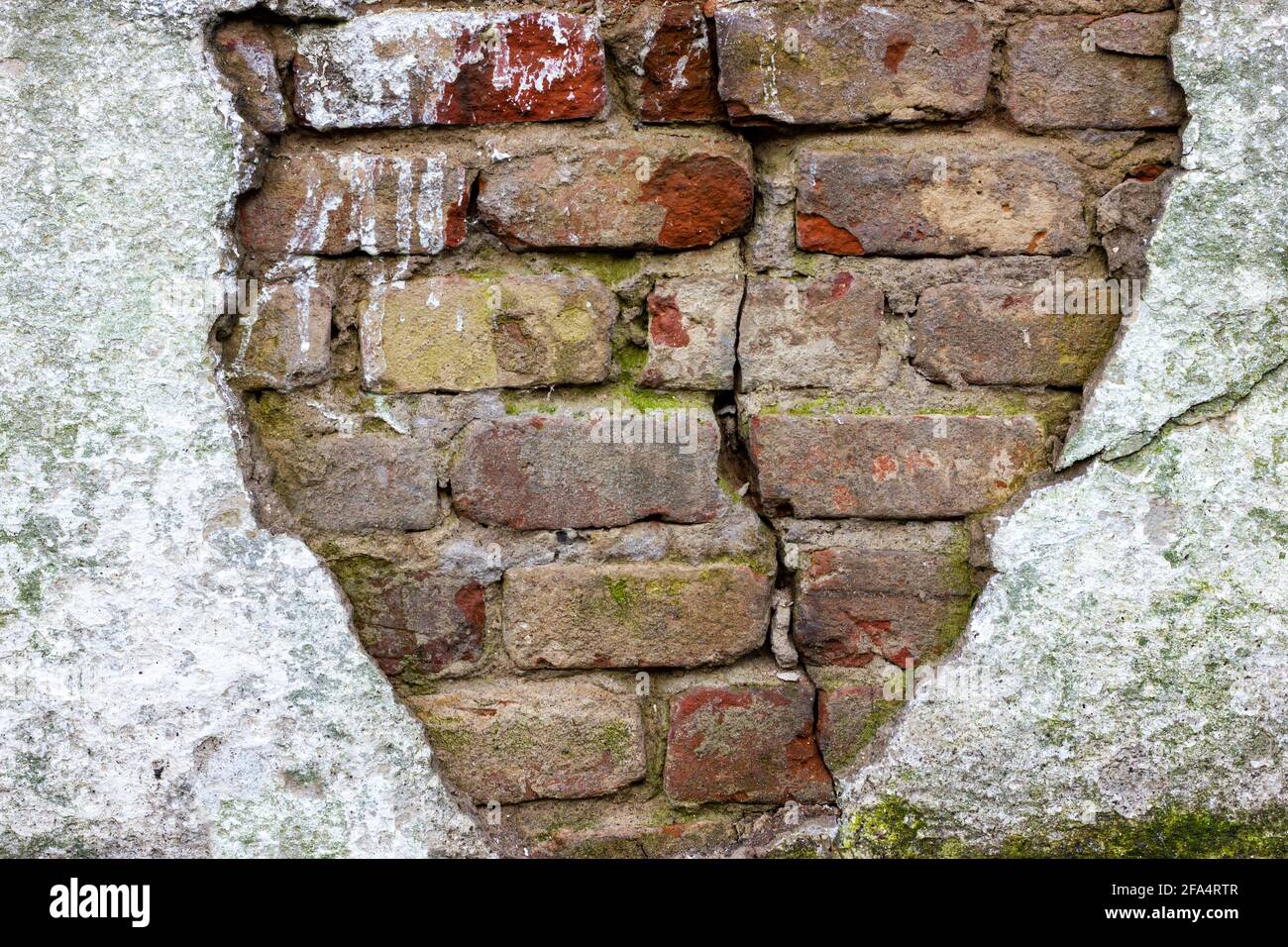 Old destroyed wall. Damaged brick wall. Brickwork with a crack Stock ...
