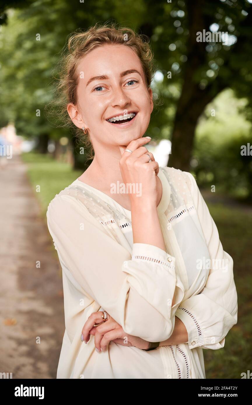 Woman brackets on teeth hi-res stock photography and images - Alamy