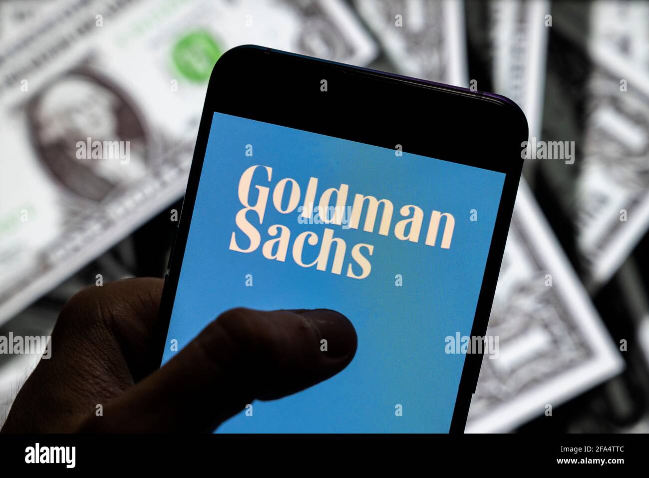 In this photo illustration the Gold man Sachs logo seen on an Android ...