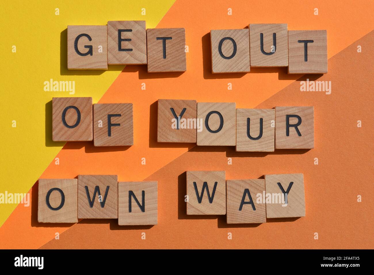 Get Out of Your Own Way, words in wooden alphabet letters isolated on ...