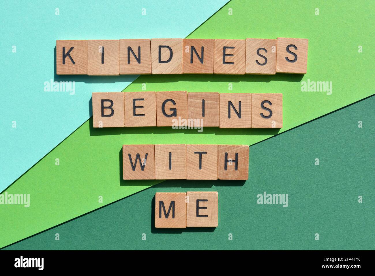 Kindness Begins With Me, words in wooden alphabet letters isolated on ...