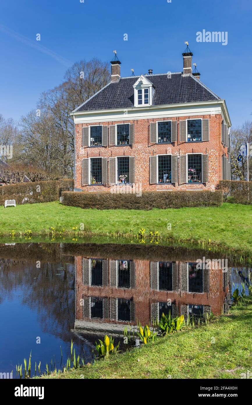 Pond in the garden of historic mansion ennemaborg in Midwolda ...
