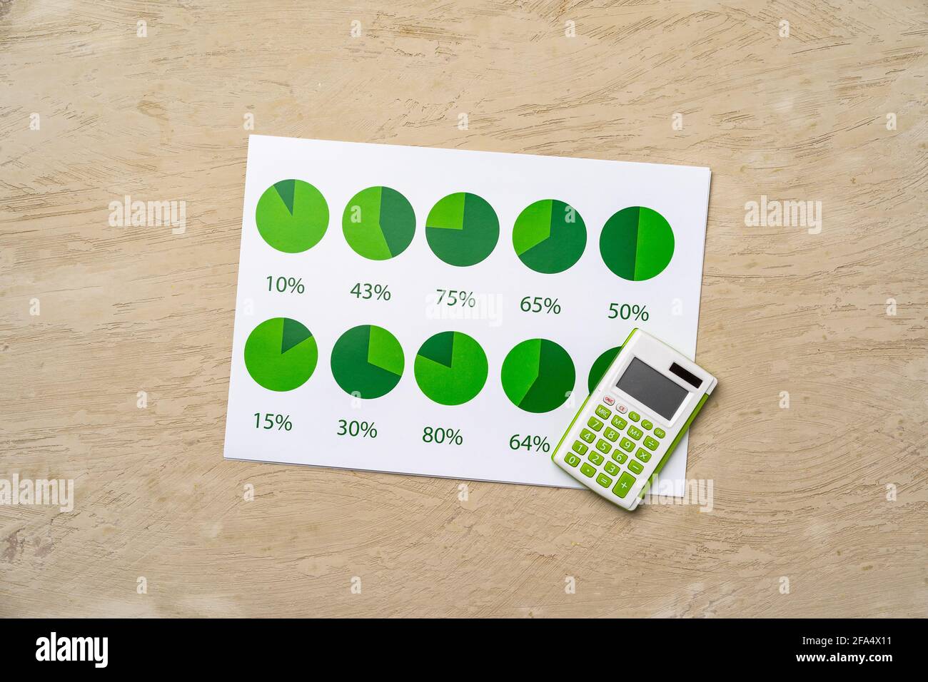 Financial paper with charts and diagrams on gray table Stock Photo - Alamy